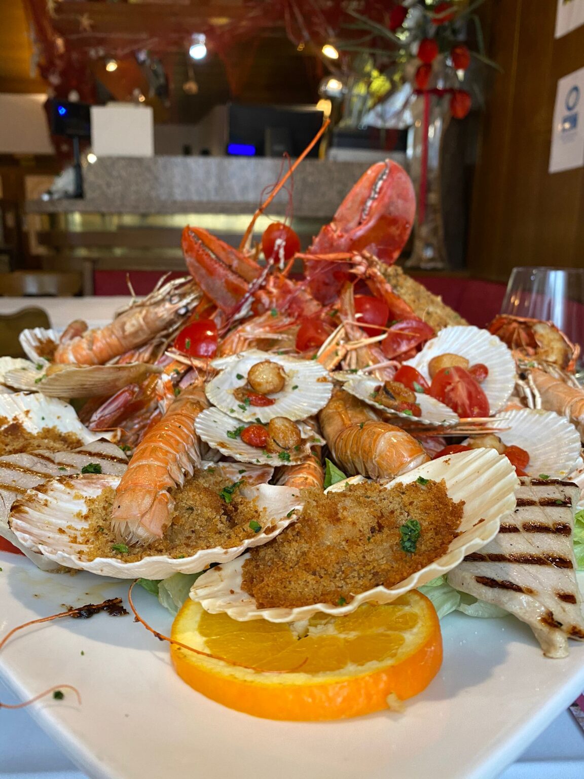 Ristorante con cucina tipica e specialità di pesce a Isera